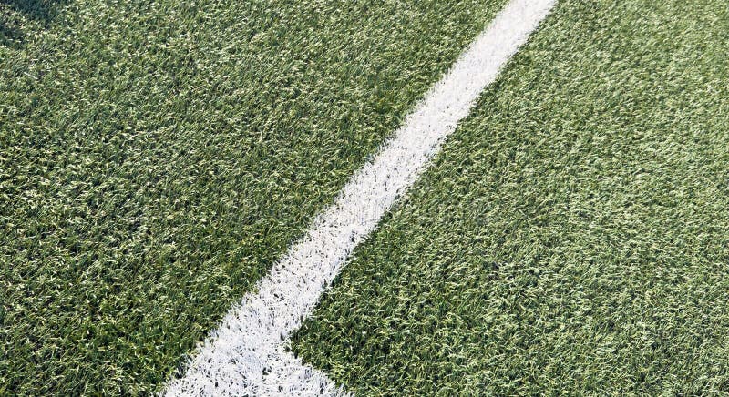The White Line Marking on the Artificial Green Grass Soccer Field Stock ...