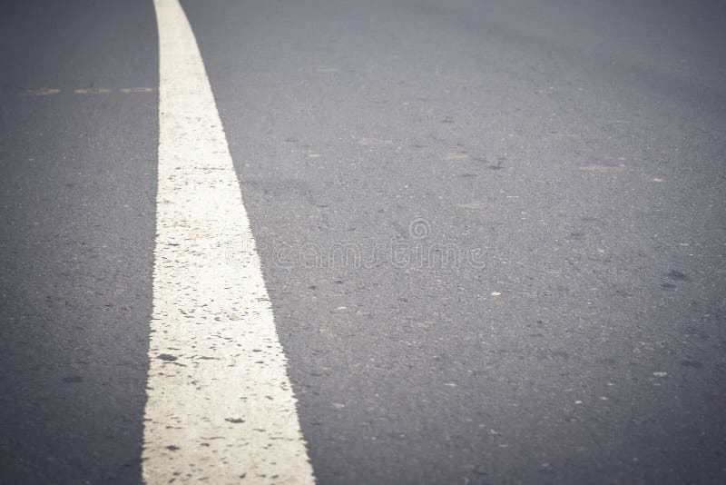 White line on new road. stock photo. Image of level - 103205938