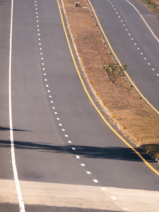 White Line Traffic on the Way Up Stock Photo - Image of plant, public ...