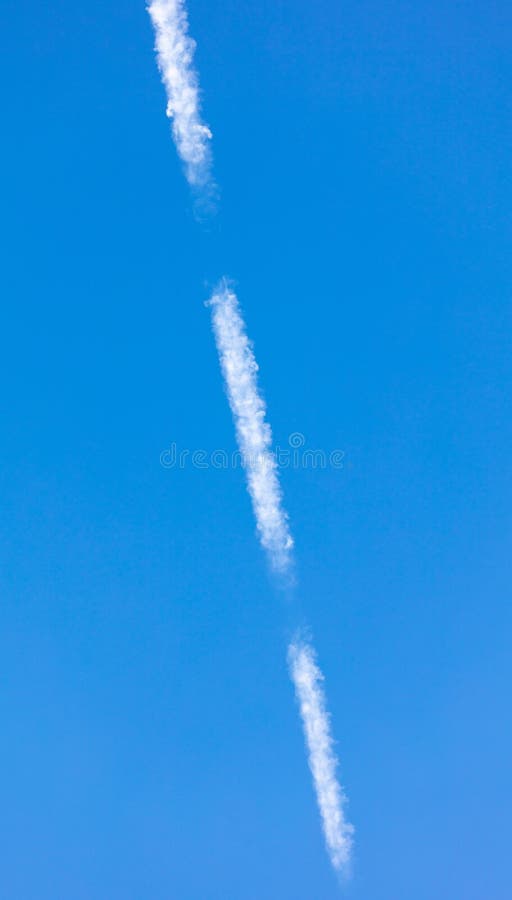 White Lines from an Airplane Against a Sky. Stock Photo - Image of ...