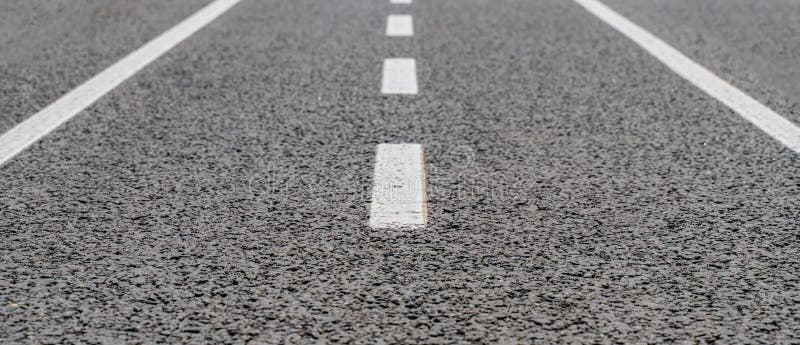 White Lines on the Asphalt Close-up, Road Markings Direction of ...
