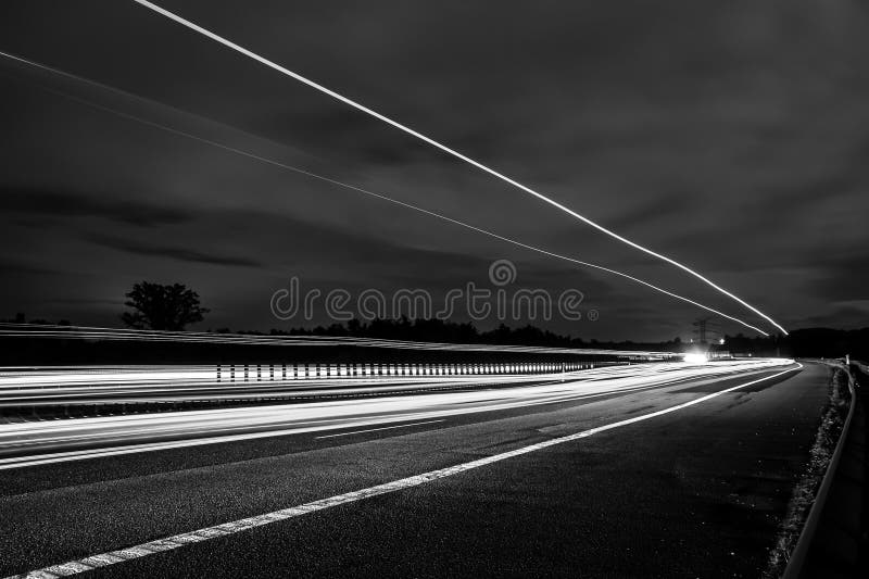 White Lines of Car Lights on Black Background Stock Photo - Image of ...