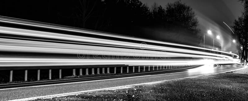 White Lines of Car Lights on Black Background Stock Photo - Image of ...