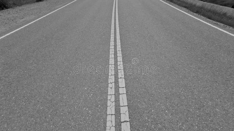 White Lines in the Center of an Empty Asphalt Road Stock Video - Video ...