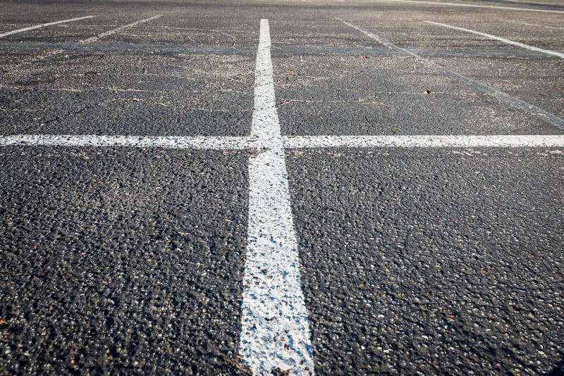 White Lines Intersect on Parking Lot Stock Image - Image of cross ...
