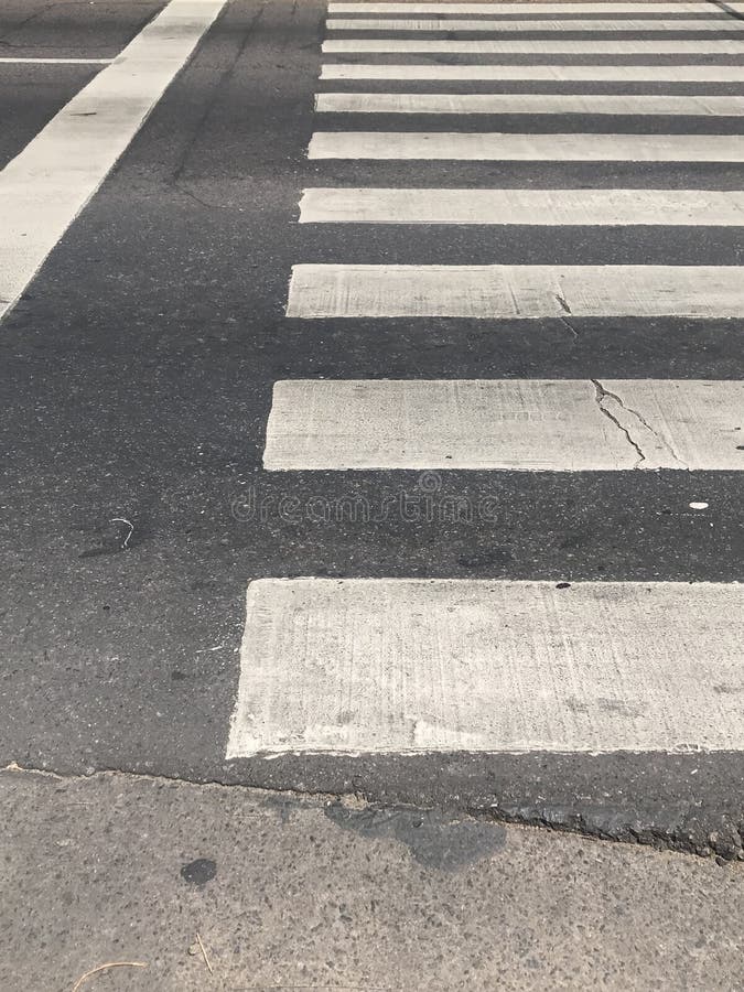 White Lines of a Pedestrian Path To Cross the Street Stock Photo ...