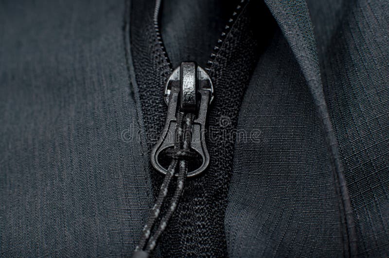 White Lock with a Zipper on Clothes, Jacket, Jacket Close-up on a Black ...