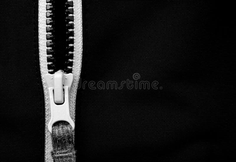 White Lock with a Zipper on Clothes, Jacket, Jacket Close-up on a Black ...