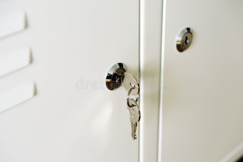 White Metal Cabinet with Lock and Key. Stock Photo - Image of metal ...
