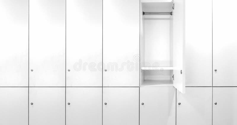 White locker in fitness stock image. Image of clean - 165608139