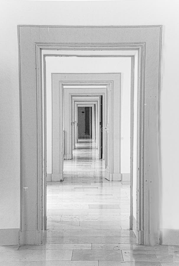 White Long Corridor with Many Doors Stock Photo - Image of doors ...