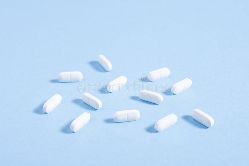 White long pills stock image. Image of health, concept - 119927583