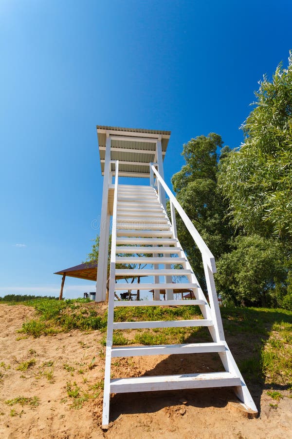 White Lookout Tower at a Beach Stock Photo - Image of holiday, rescue ...
