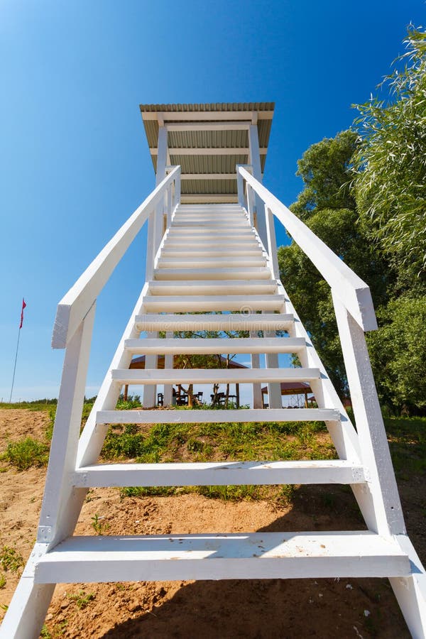 White Lookout Tower at a Beach Stock Photo - Image of river, protection ...