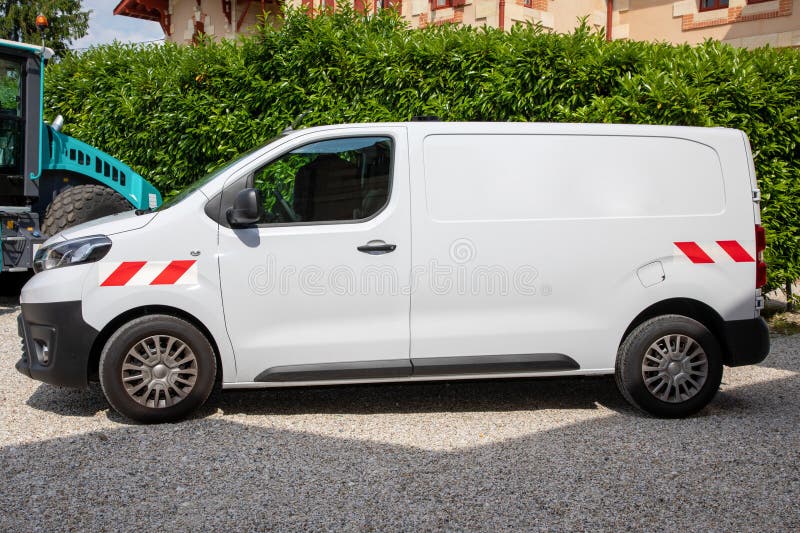 White Lorry Truck Panel Van with Reflective Strips Parked with White ...