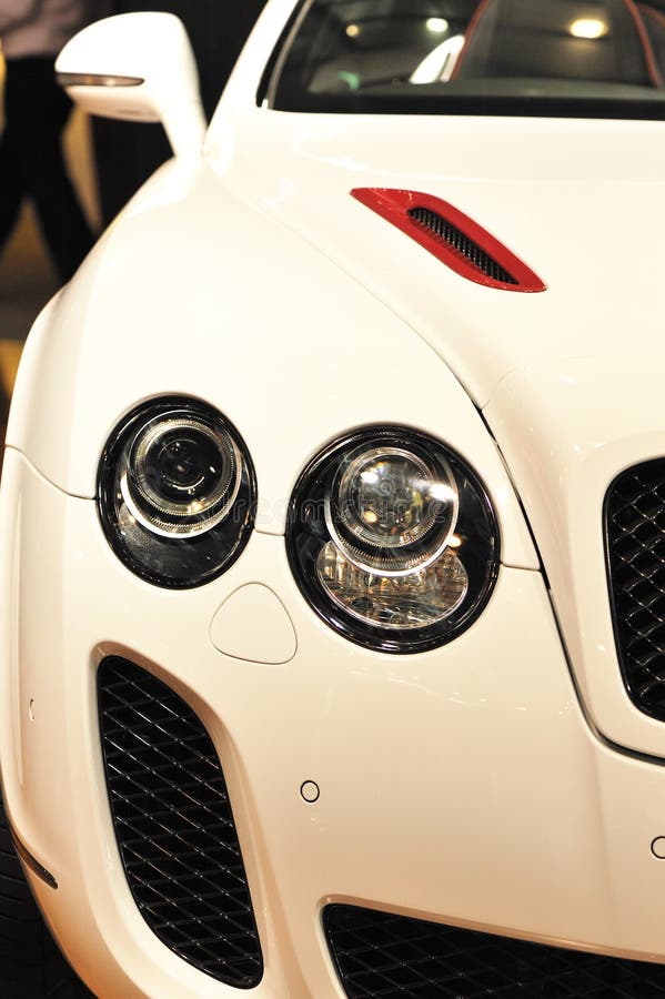 White luxury car stock image. Image of black, tire, park - 25324029