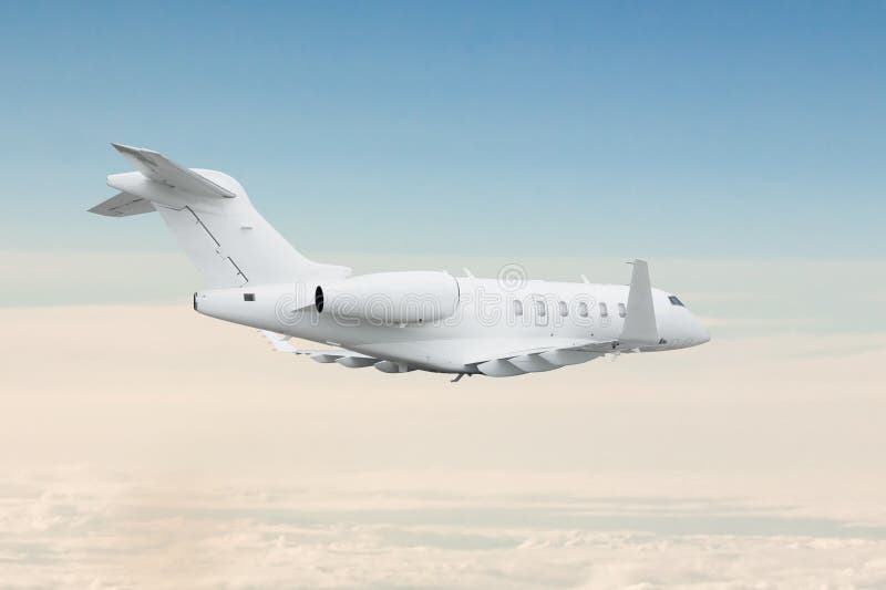 White Luxury Business Jet Fly in the Air Above the Clouds Stock ...