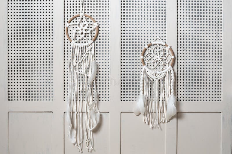 White Macrame Decoration on White Structure Wall Stock Image - Image of ...