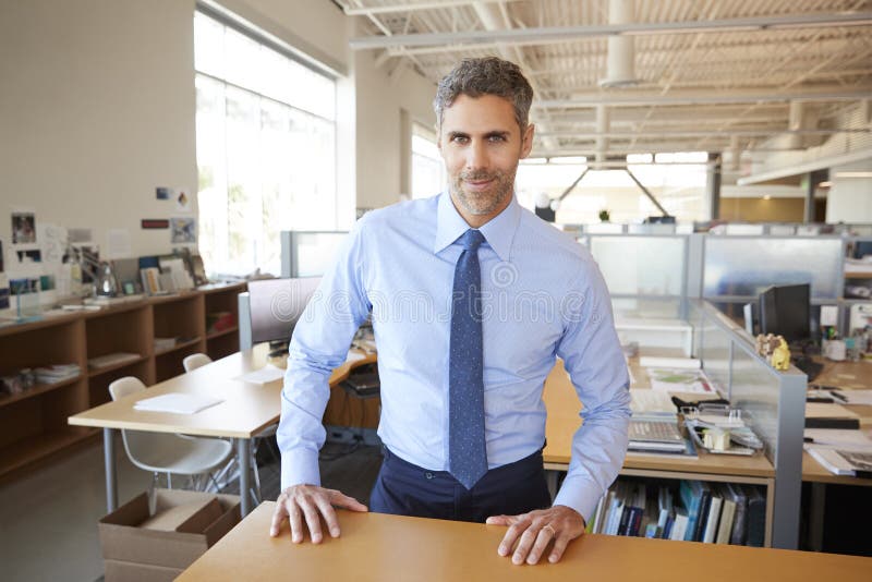 White Male Architect Behind Desk in Office Looking To Camera Stock ...