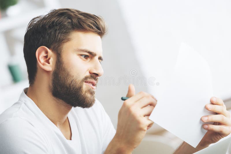 White Man Examining Document Side Stock Photo - Image of insurance ...