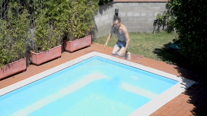 A White Man`s Bomb Dive into a Swimming Pool, Top View Stock Video ...