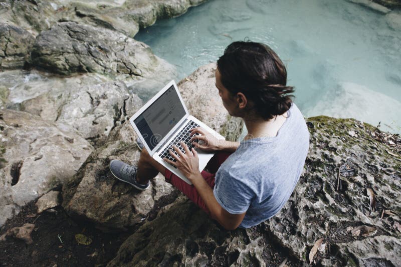 White Man Using Computer Laptop at Waterfall Stock Image - Image of ...