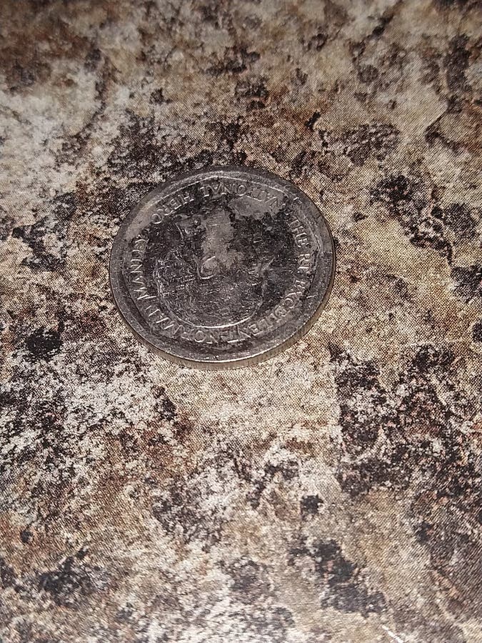 White Marble with Jamaican Coin Silver Stock Photo - Image of silver ...