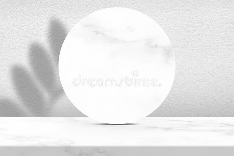 White Marble Table and Circle Marble Partition with Leave Shadow on ...