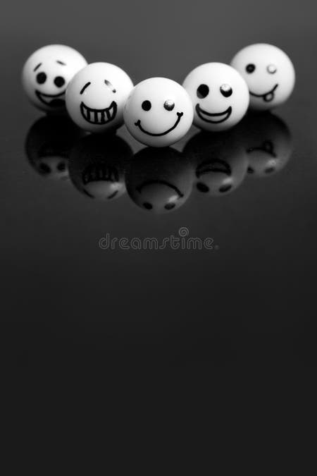 White marbles with faces stock photo. Image of glass - 70133770