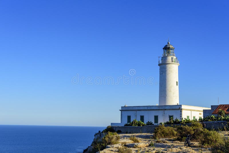 White Maritime Lighthouse with Blue Sky Stock Photo - Image of horizon ...