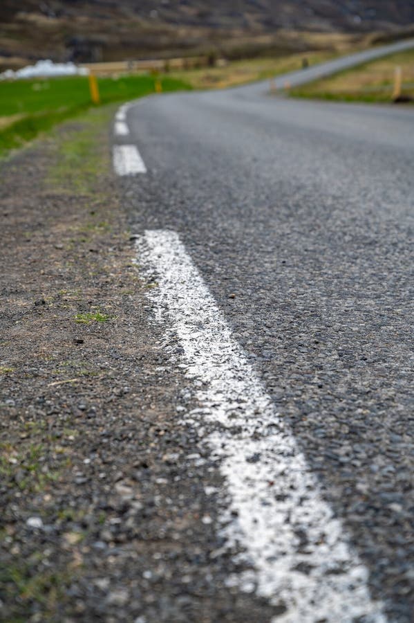 White Mark on Asphalt Street, Iceland, Vertical Shot Stock Photo ...