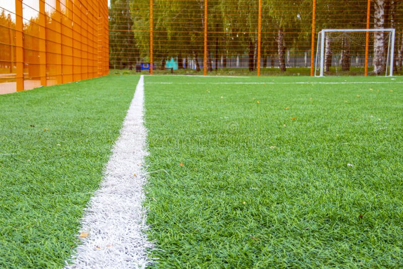 White Markings on the Artificial Turf of a Football Field Stock Photo ...