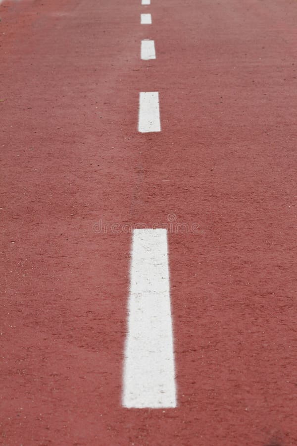 White Marks on Roadside Red Cycle Stock Image - Image of route, path ...