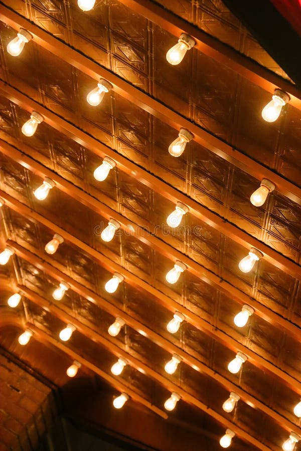 White Marquee Overhang Lightbulbs on Stamped Tin Stock Photo - Image of ...