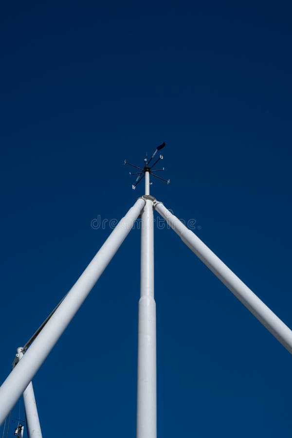 On the White Mast There is a Wind Direction Indicator Stock Photo ...