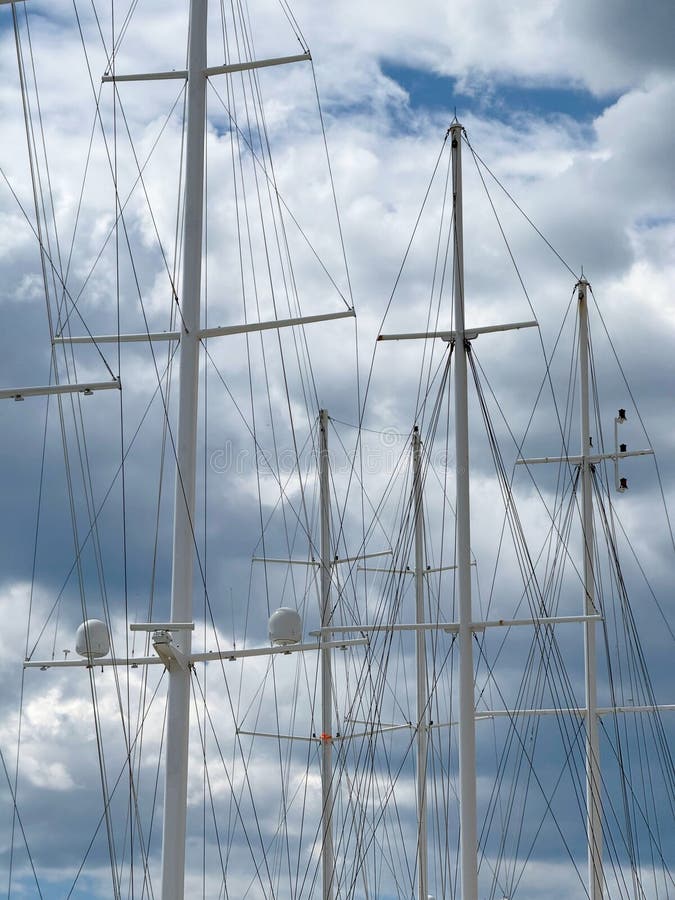 White Masts of Ships Against a Cloudy Sky Stock Photo - Image of yacht ...