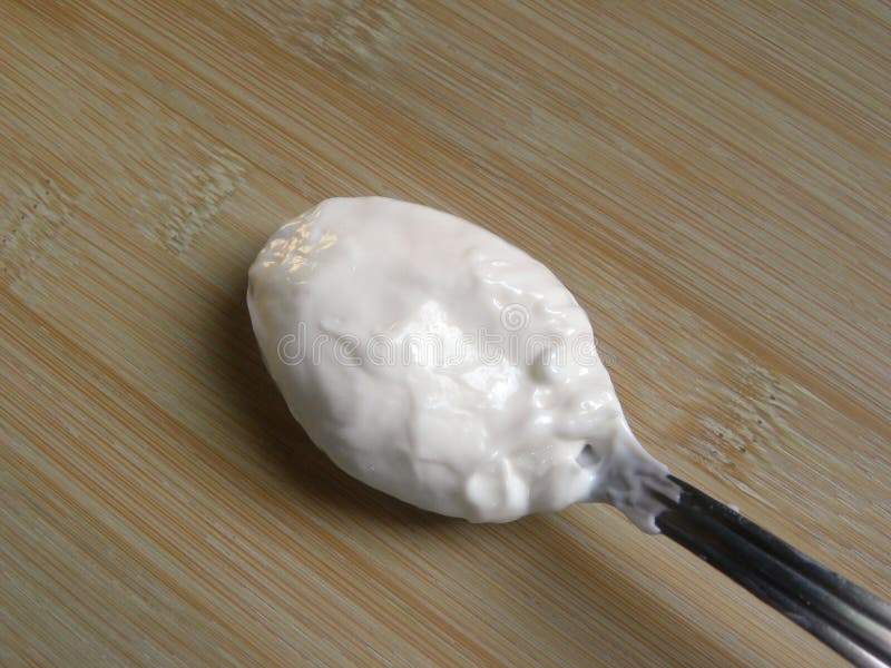 White Mayonnaise on spoon stock photo. Image of creamy - 175788548