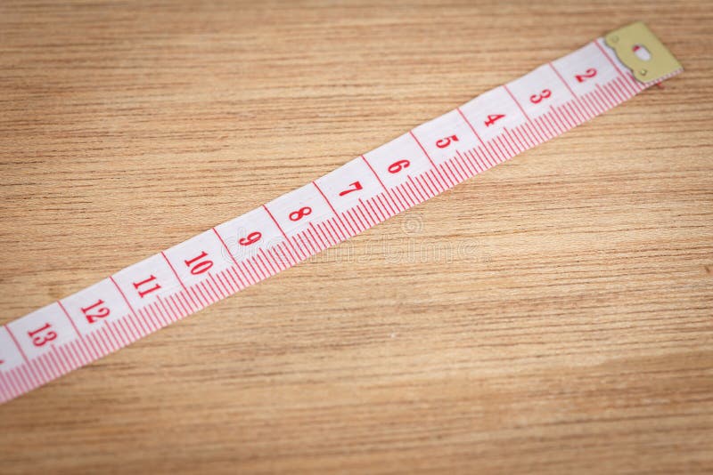 White Measure Tape on Wood Texture Stock Photo - Image of measuring ...