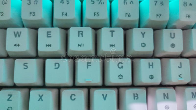 White Mechanical Keyboard with Colorful Illuminated Caps Stock Photo ...