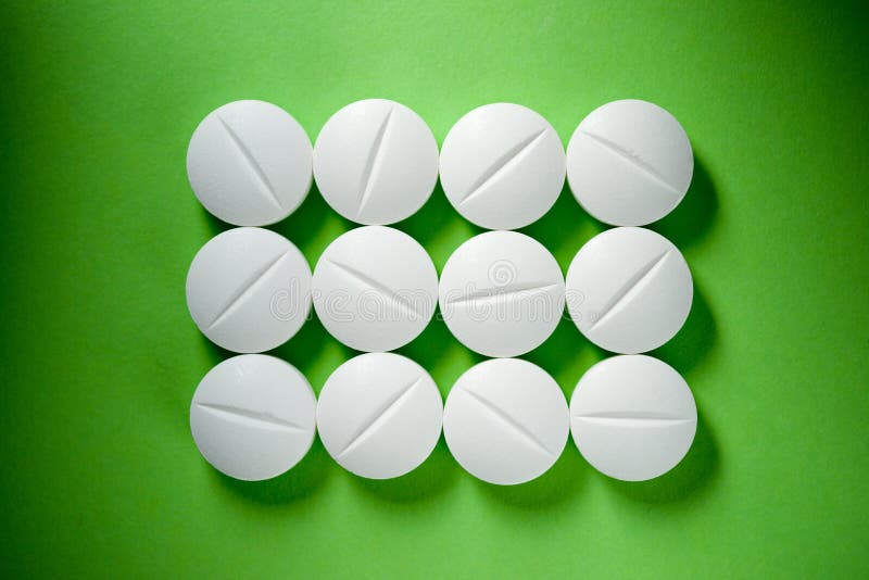White Medicine Tablets on a Table Stock Image - Image of medicament ...