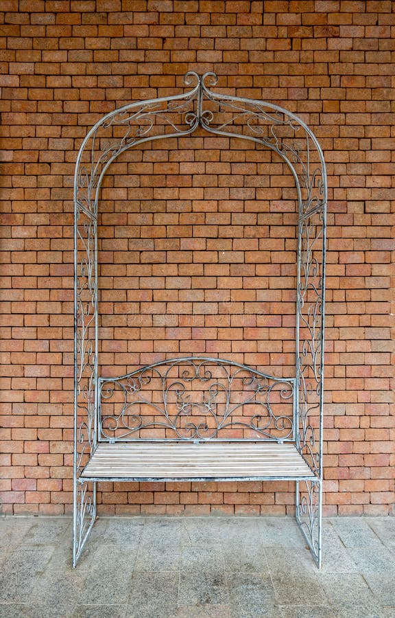 White metal arch bench stock image. Image of chair, house - 148061577
