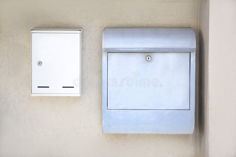 White Metal Letter Boxes on Beige Wall Stock Photo - Image of ...