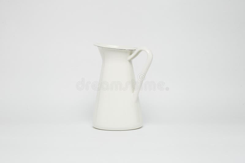 White Metal Milk Pitcher. Isolated on White Background Stock Image ...