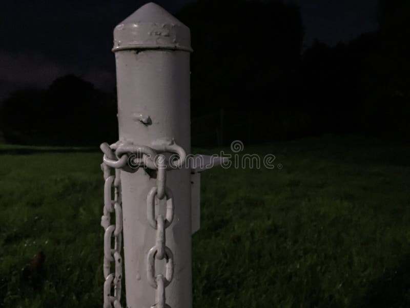 Post & Chains at Dusk stock photo. Image of moody, dusk - 1546118