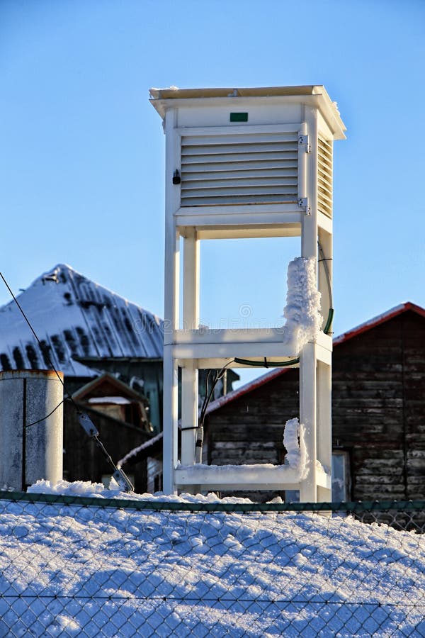 White Meteorologic Box in Light Snow Stock Photo - Image of roof, blue ...