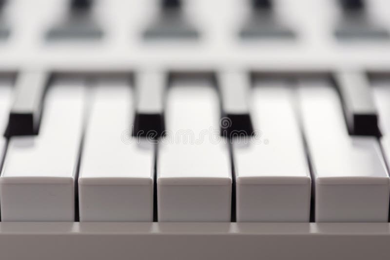 White MIDI Keyboard with Pads and Faders. Stock Photo - Image of note ... White MIDI Keyboard with Pads and Faders. Stock Photo - Image of note ...
