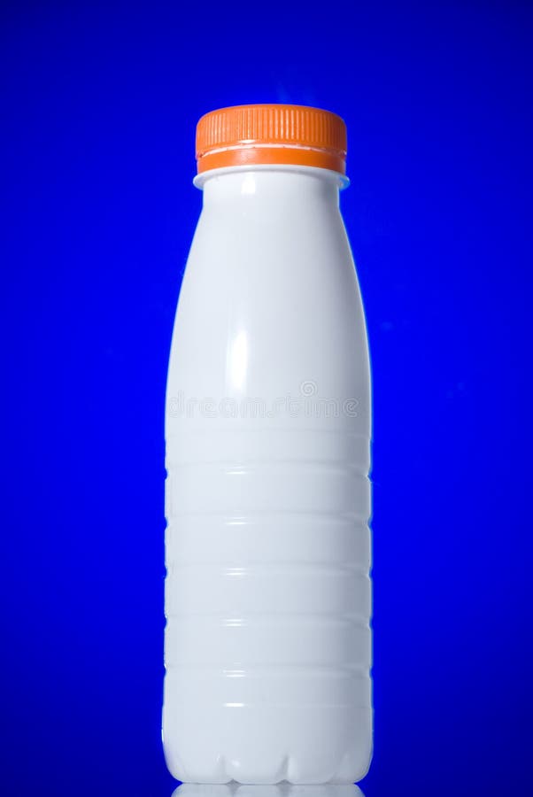 White milk bottle isolated stock image. Image of flowing - 13477701