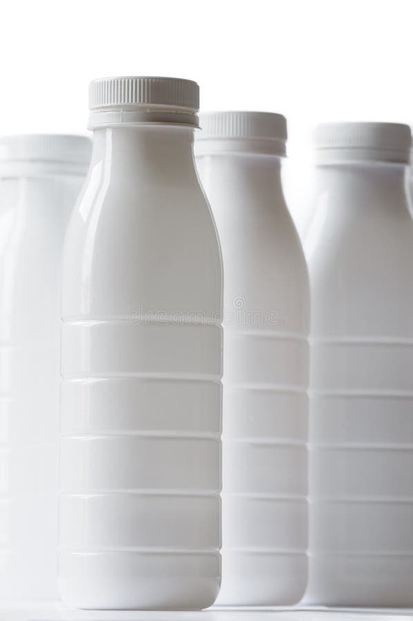 Bottles of milk stock image. Image of cage, semi, shelves - 22797995