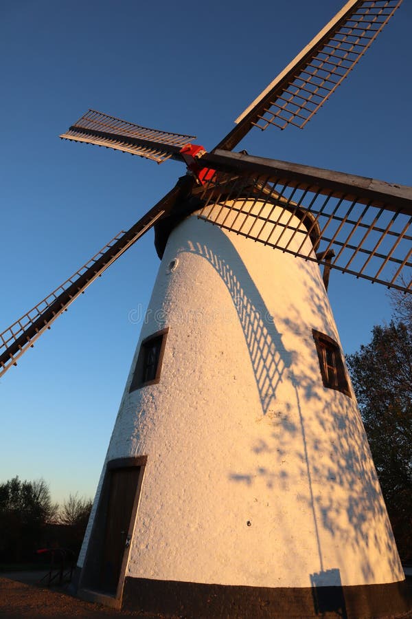 White Windmill Close Up with Casting Shadows. Stock Photo - Image of ...