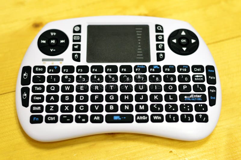 A White Mini Keyboard Placed on Table Stock Image - Image of connection ...